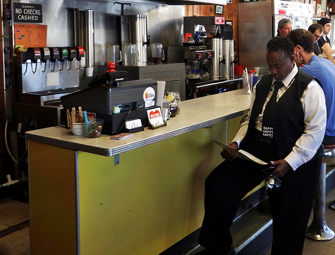 The counter where breakfast dreams come true. Notice there's no bell to ring for service&mdash;they're already watching for you.