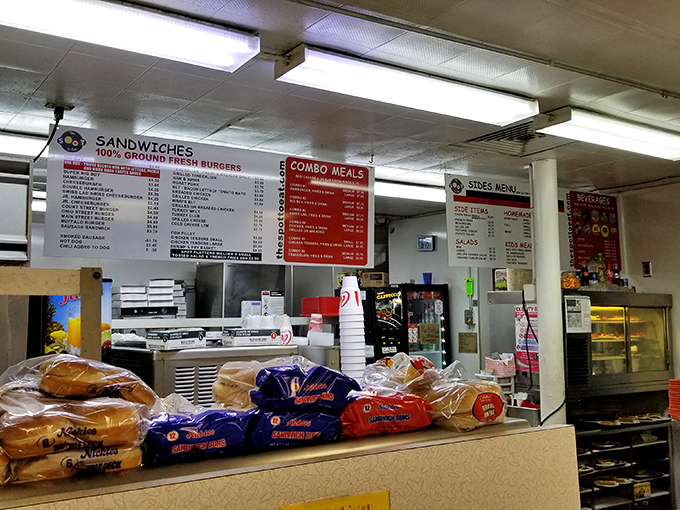 The counter service area showcases fresh-baked buns and desserts, a tempting display that makes "I'll just have coffee" an impossible statement.