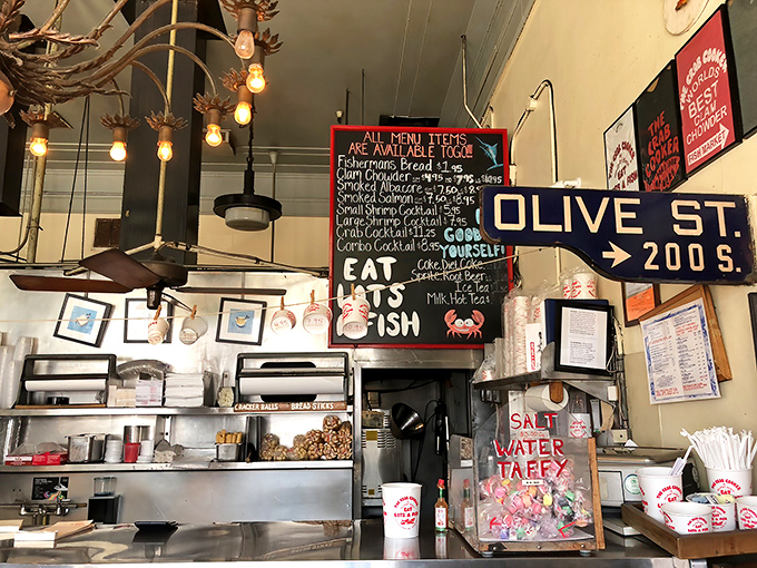 "EAT LOTS A FISH" isn't just a suggestion, it's practically a commandment at this counter where seafood dreams come true.