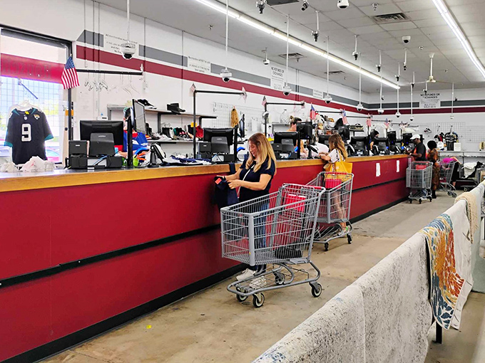 The checkout: final gateway between browsing and ownership. Those red counters have witnessed countless "You won't believe what I found for just&hellip;" conversations.