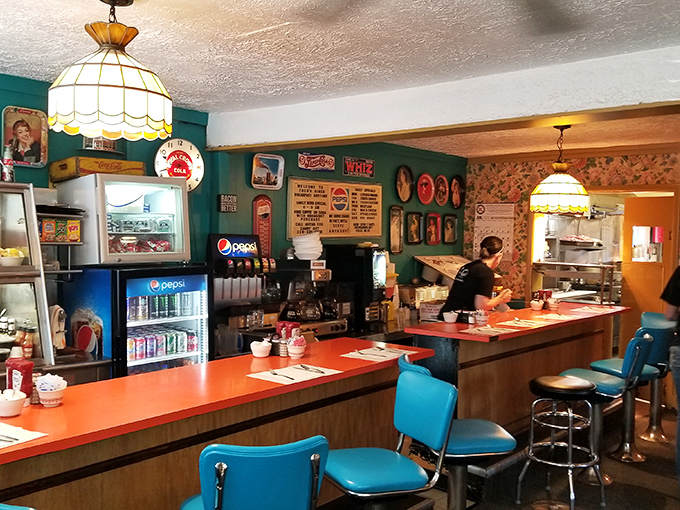 The counter—that sacred space where solo diners find community, coffee achieves perpetual warmth, and the short-order ballet unfolds before your eyes.