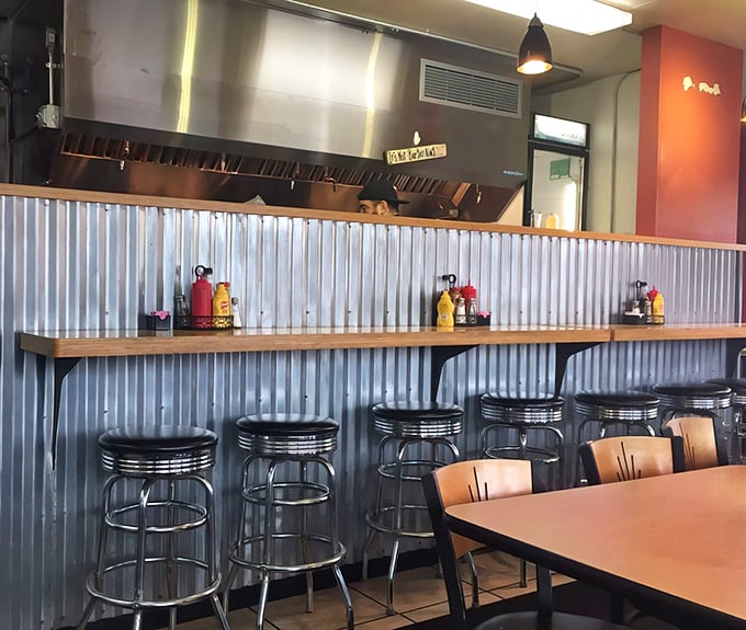 Counter seating: where solo diners become part of the diner family and the sizzle of the grill provides the perfect soundtrack.