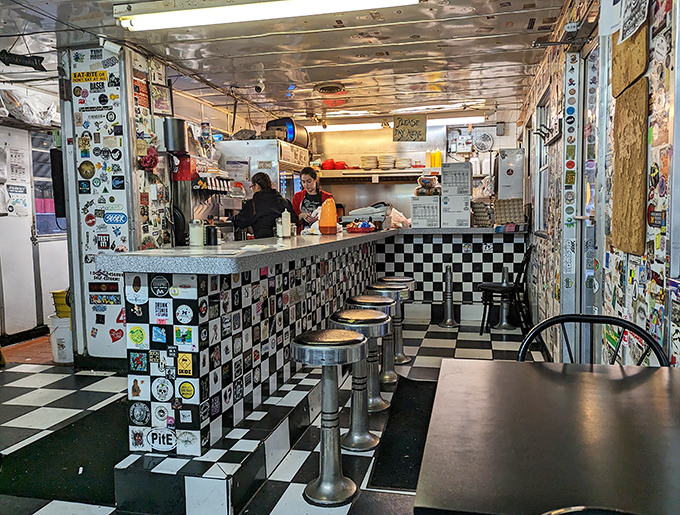 The checkered counter&mdash;where elbows have rested, stories have been shared, and countless cups of coffee have been drained.