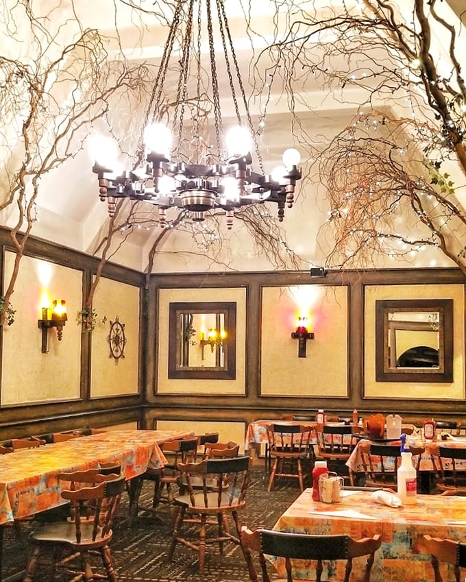 Warm lighting and comfortable seating create the perfect backdrop for serious barbecue conversations and satisfied smiles.