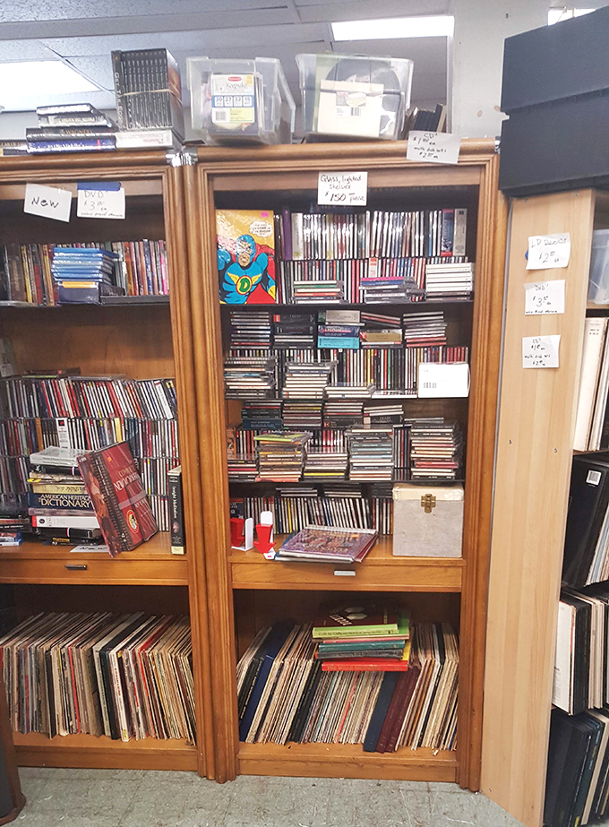 Not just media storage&mdash;this is a time capsule of entertainment history. That superhero cutout stands guard over musical and cinematic treasures.