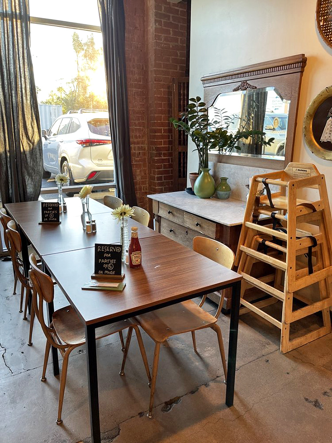 The vintage dresser and high chair in the corner aren't just decoration&mdash;they're conversation starters while you wait for your food.