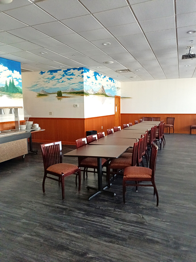 The dining area's panoramic mural continues the blue sky theme, creating an atmosphere where calories simply don't count.