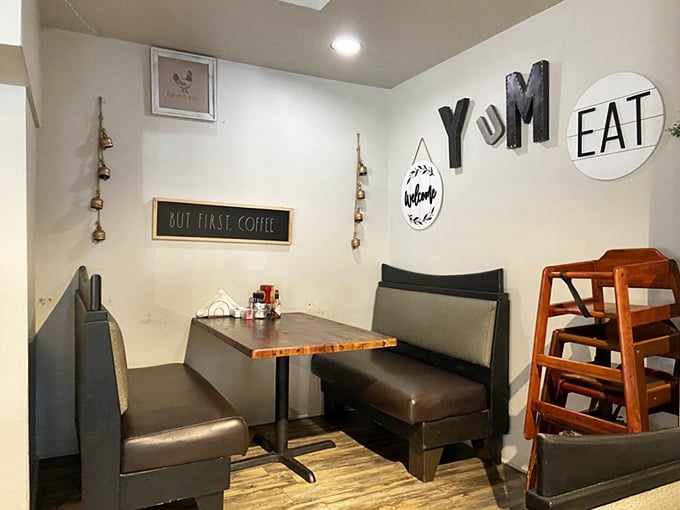 "But first, coffee" says the sign, while "YUM EAT" commands from the wall. This cozy nook understands the breakfast priorities of mere mortals.