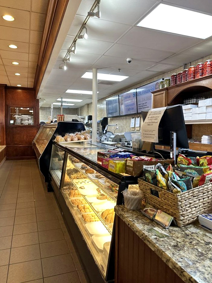 The deli counter gleams like a treasure chest, each item behind the glass promising a different kind of delicious adventure.