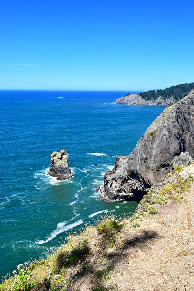 The Devil's Cauldron's hypnotic blue waters swirl beneath towering cliffs. Nature's version of performance art happens here hourly, no tickets required.