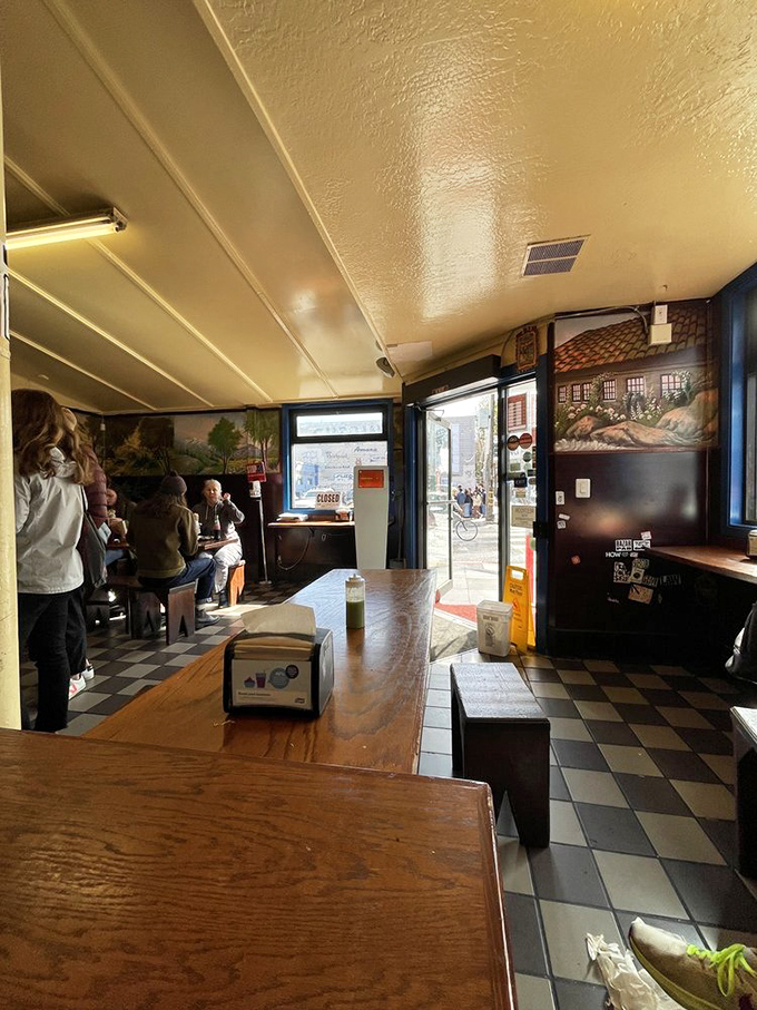 Where taco dreams come true. The checkered floor and wooden tables have witnessed countless moments of first-bite bliss.