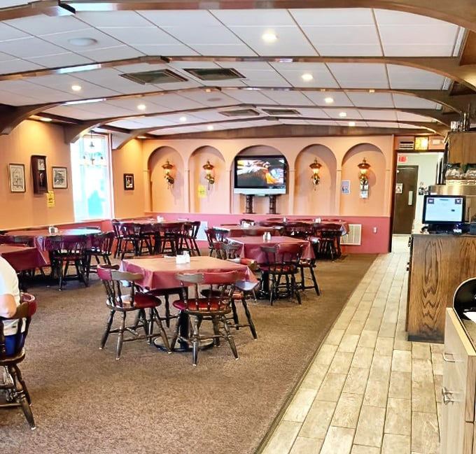 The arched alcoves and warm lighting create a dining room where nobody rushes you through your meal or your memories.