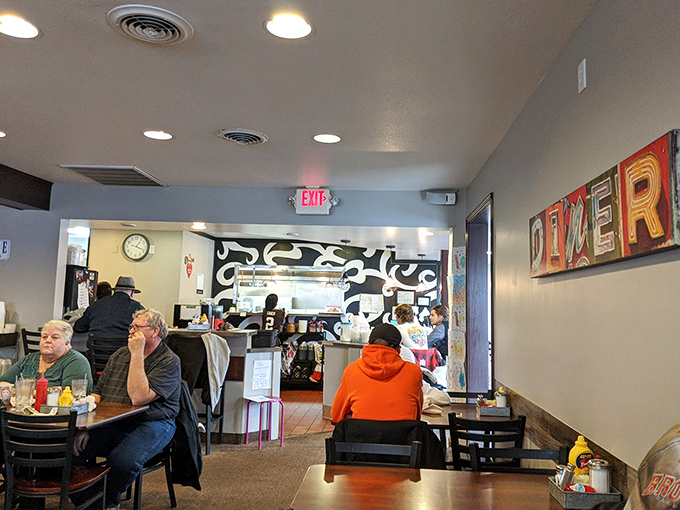 A bustling dining room that feels like a town hall meeting where the only agenda is deciding between pancakes or eggs.