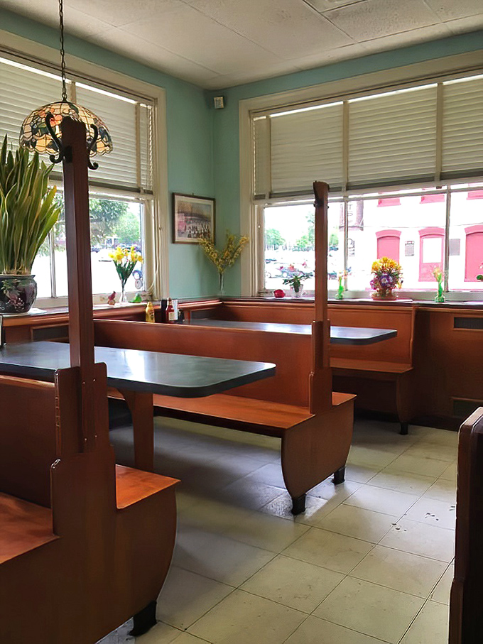 Sunlight streams through windows onto wooden booths that have witnessed first dates, family reunions, and Tuesday morning coffee clubs.