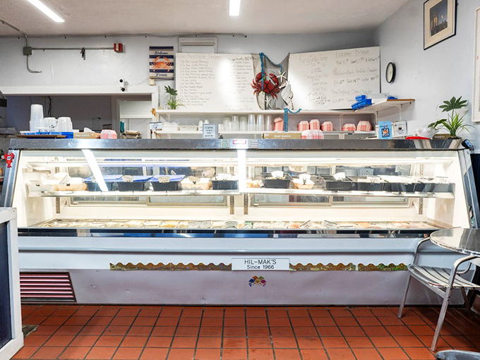 Behind this gleaming display case lies the daily catch, a treasure trove of oceanic delights waiting to make the short journey from counter to kitchen to your eager plate.