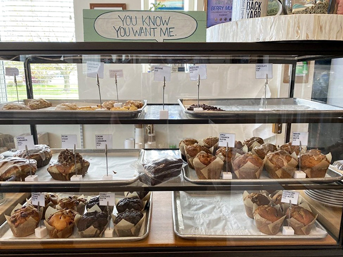 The pastry case sign says "You know you want me," and it's not wrong. These baked goods are practicing the fine art of temptation.