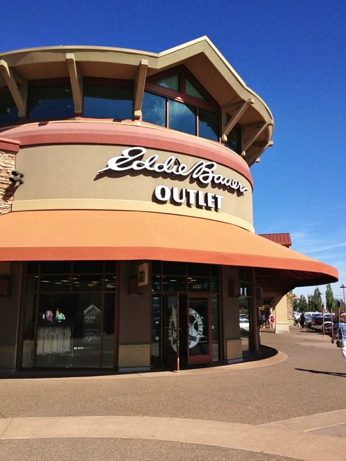 Eddie Bauer's distinctive circular storefront offers outdoor gear for adventures you'll plan after recovering from your shopping marathon.