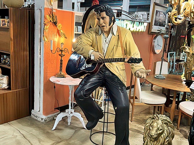 The King lives on in this life-sized tribute, eternally mid-strum, waiting for someone to appreciate his yellow jacket and perfectly coiffed pompadour.