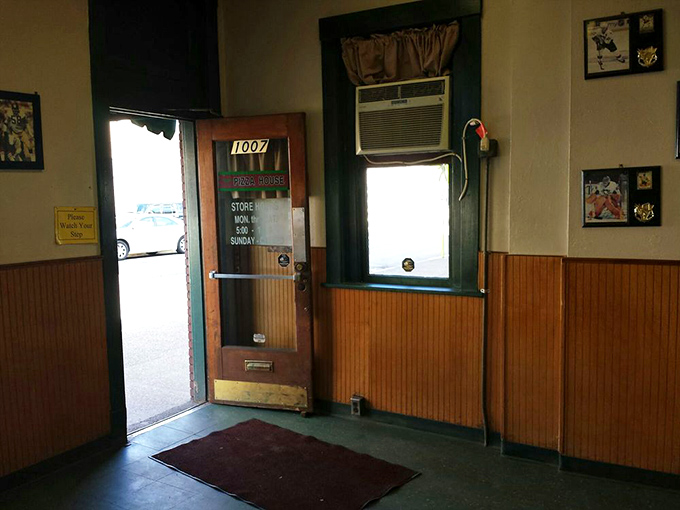 That humble entrance leads to pizza paradise – sometimes the best adventures start with simple doors.