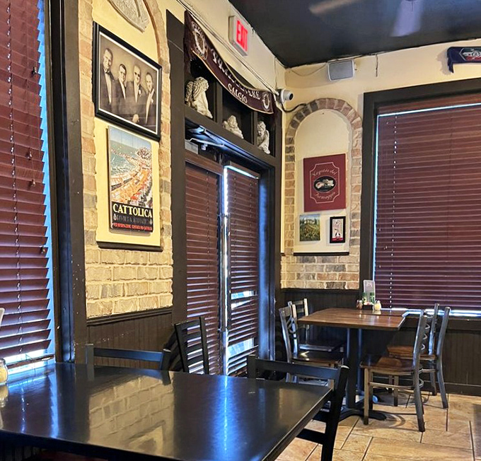 Rustic brick walls and carefully chosen artwork create an atmosphere that feels both timeless and welcoming&mdash;like dining in an Italian family's home.