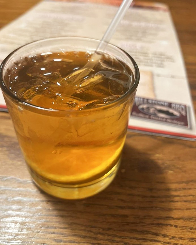 Sweet tea: the unofficial champagne of BBQ joints, served properly&mdash;with enough ice to sink a small ship. 