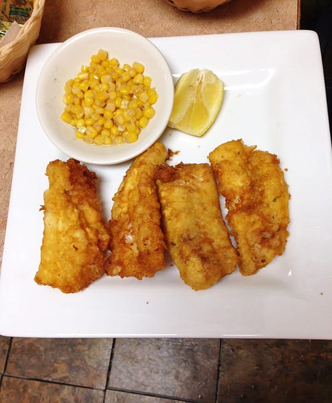 Golden-battered fish that shatters with each bite, served with sweet corn that tastes like it was picked this morning. Midwestern seafood done right.