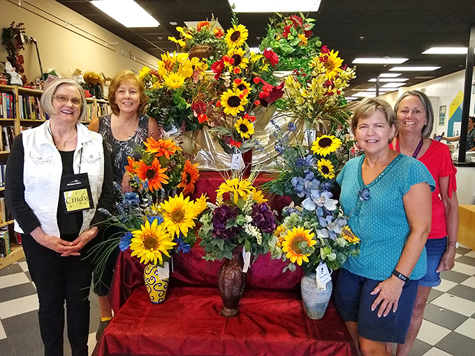 The volunteer spirit blooms as brightly as these sunflower arrangements. These smiles are the secret ingredient in this thrift store's special sauce.