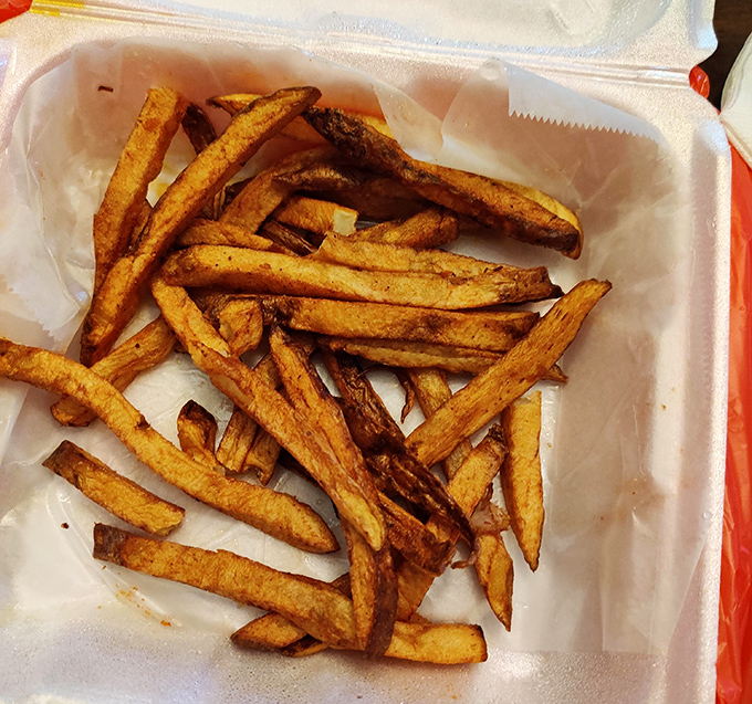 French fries cut thick and seasoned right, the supporting cast that never upstages the main attraction.