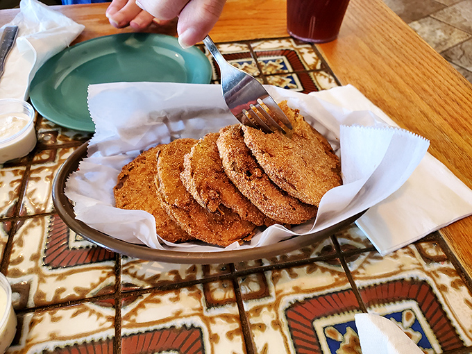 Fried green tomatoes with the perfect golden crust &ndash; a Southern classic that transforms an unripe fruit into something worth fighting over. 