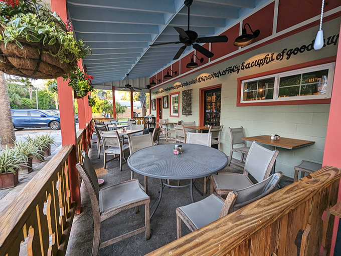 The front porch seating area where ocean breezes enhance your coffee. Those ceiling fans are just for show when Folly's natural AC kicks in.