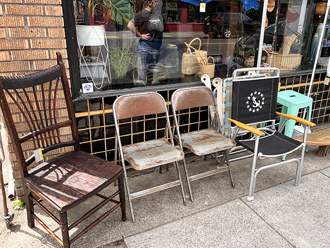Sidewalk seating that's seen some living. These chairs aren't just furniture; they're time machines with backrests.