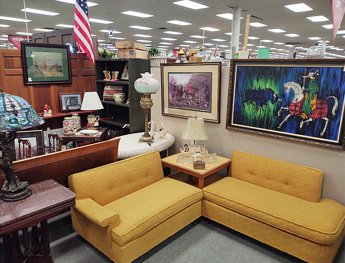 Mid-century mustard sectional looking for its forever home. That couch has hosted more interesting conversations than most talk shows.