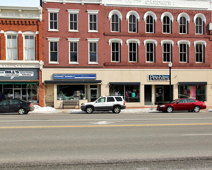 The Gardner Building stands as a testament to brick craftsmanship, housing businesses that have evolved while the architecture remains gloriously unchanged.