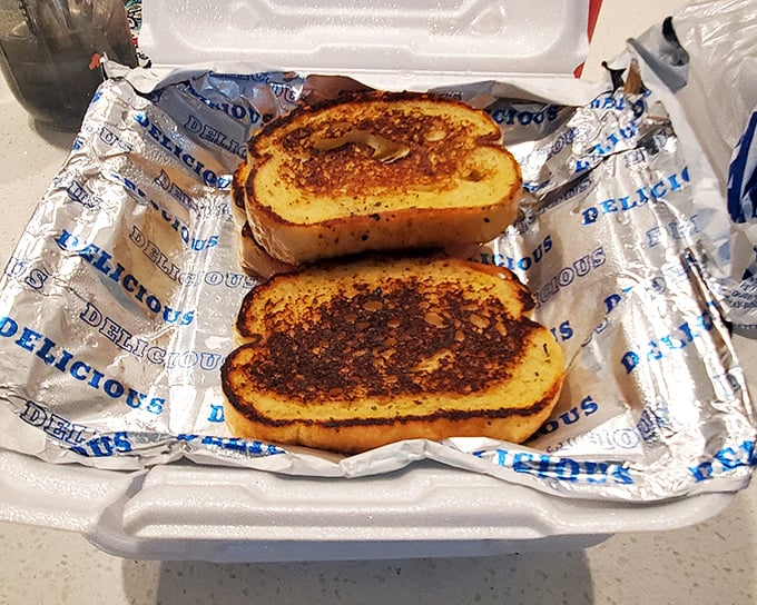 Garlic bread that arrives golden and aromatic, proving simple ingredients can create extraordinary moments of happiness.