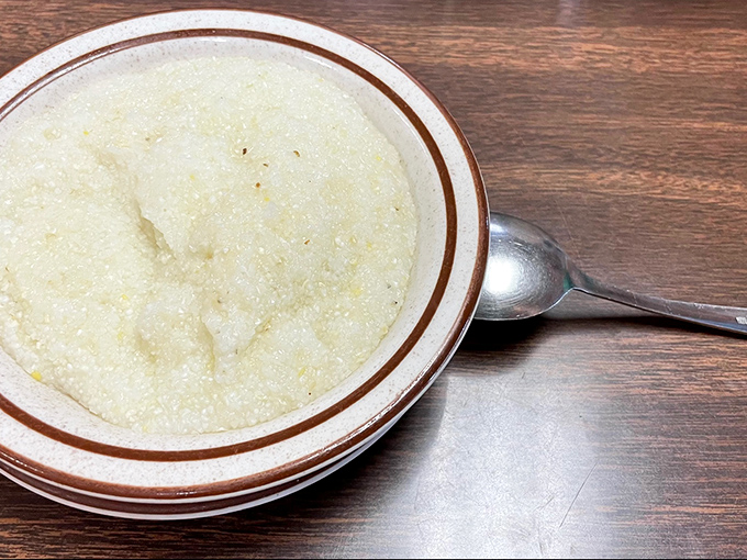 Creamy grits that would make a Southerner nod in approval &ndash; comfort food that transcends regional boundaries.