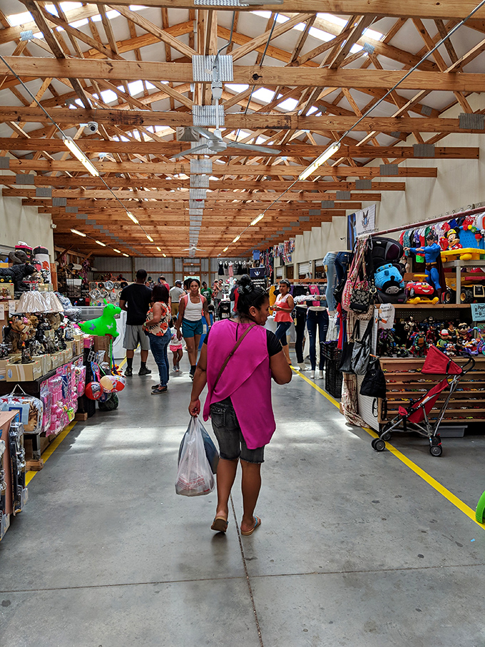 The market's wooden-beamed corridors stretch into the distance like an Indiana Jones temple of treasures, minus the booby traps.