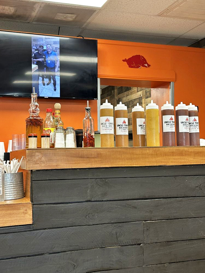 The sauce lineup&mdash;liquid gold in squeeze bottles&mdash;where your BBQ journey takes its final, crucial flavor direction.