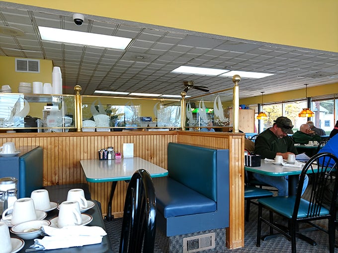 Blue booths and wood wainscoting create little islands of conversation in a sea of delicious aromas.