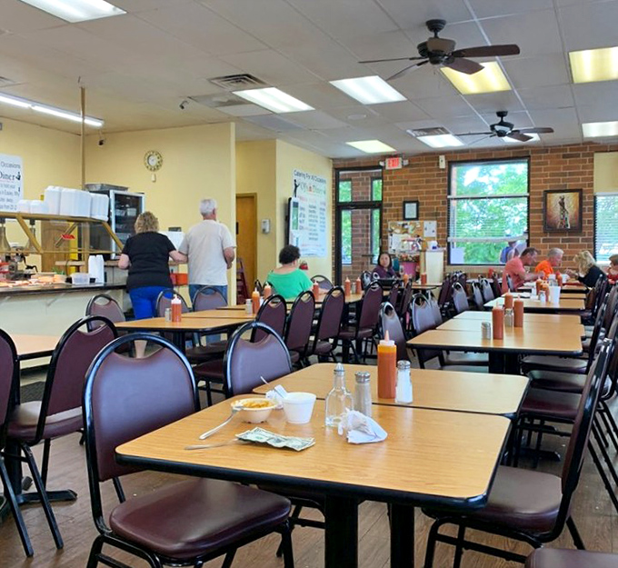 The casual interior might not win design awards, but those ceiling fans have witnessed more food euphoria than most five-star restaurants ever will.