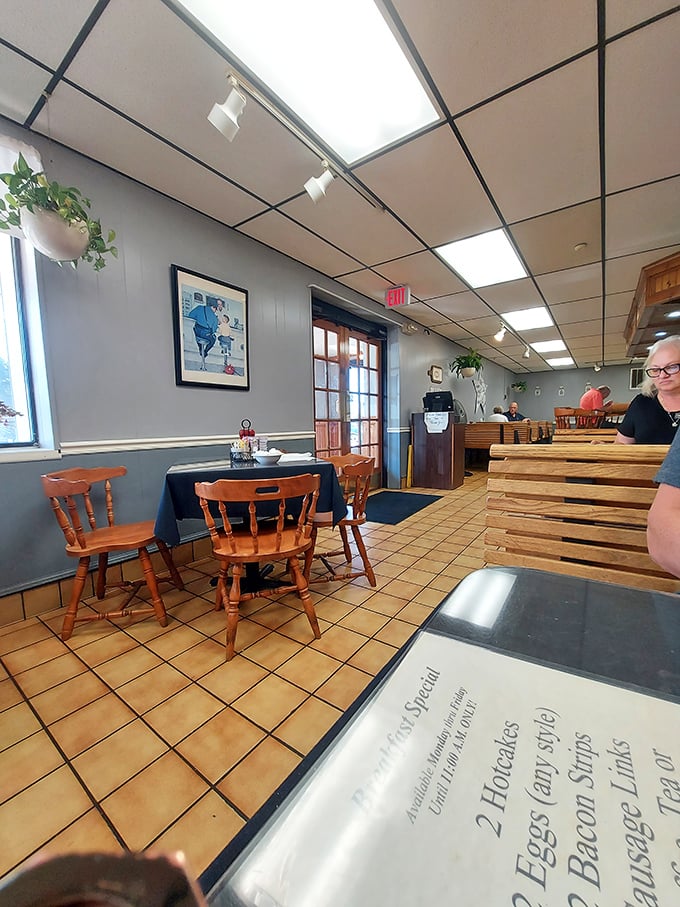 Wooden chairs, tile floors, and hanging plants create the perfect backdrop for the serious business of starting your day right.