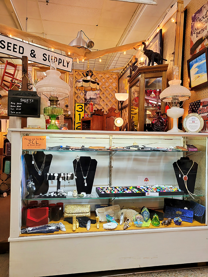 Jewelry cases in antique malls are like archaeological digs where each layer reveals another era's definition of "must-have accessories."