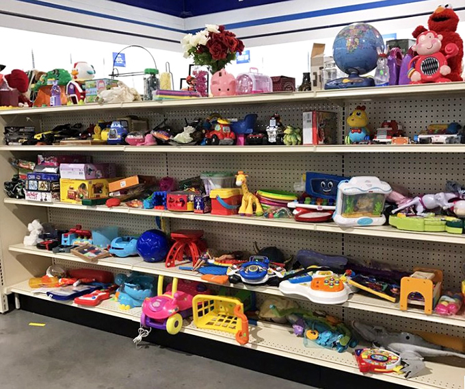 The toy section: where childhood memories get their second act. Elmo, giraffes, and plastic wonders await adoption into new playroom adventures.