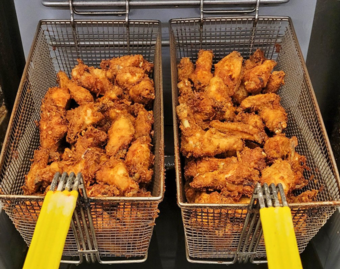 Fresh from the fryer, these golden baskets of joy make you understand why people cross county lines for Barberton chicken.