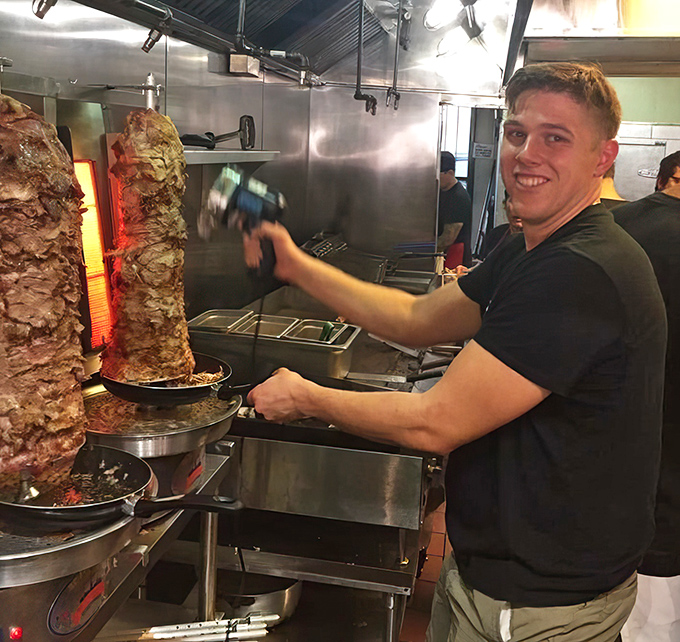 Behind every great gyro is someone wielding a knife with the precision of a surgeon and the soul of a Greek yiayia.