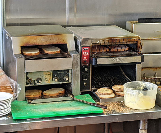 Behind every perfect toast lies the unsung hero: the commercial toaster, steadily browning bread to golden perfection while kitchen choreography unfolds around it.