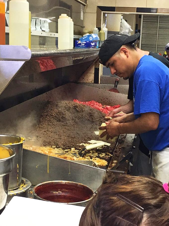 Behind the scenes magic: watching skilled hands transform simple ingredients into legendary sandwiches is Philadelphia's best free show.