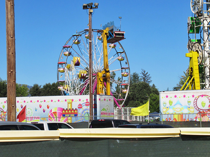 The Lake County Fairgrounds' carnival rides spin against blue skies, creating the kind of wholesome entertainment that makes you temporarily forget about streaming services.