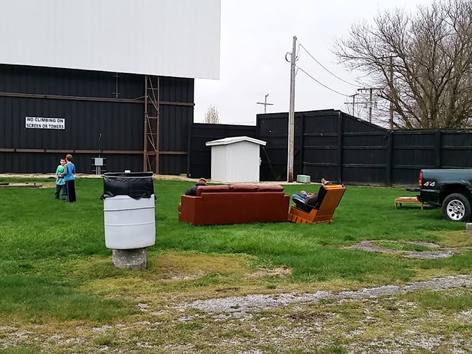 Behind-the-scenes glimpse shows the practical side of movie magic. Even comfy couches find their way to this creative outdoor cinema space.
