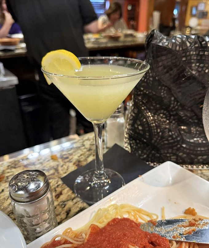 A lemon drop martini that's both sophisticated and dangerously drinkable. The perfect companion while deciding between pasta and that famous crab cake.