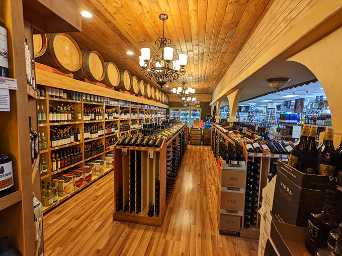 Wine enthusiasts rejoice at shops like this well-stocked emporium. The wooden ceiling and barrel decor create the perfect atmosphere for selecting a post-antiquing reward.